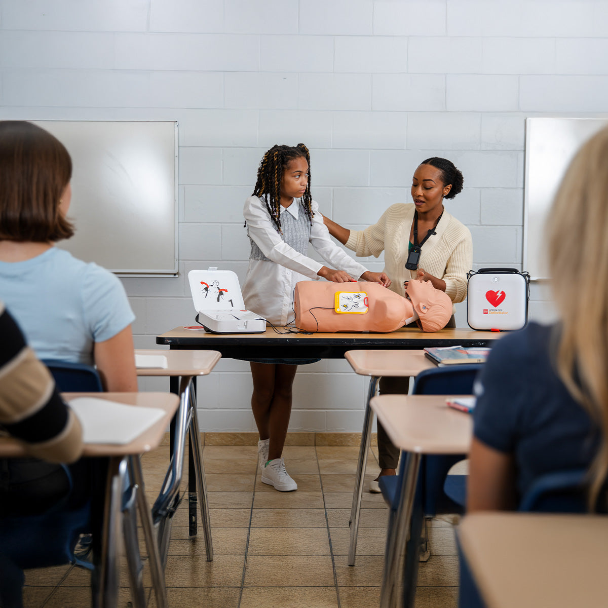 First Aid CPR AED - 10 Person Onsite Group Training — VitalAED